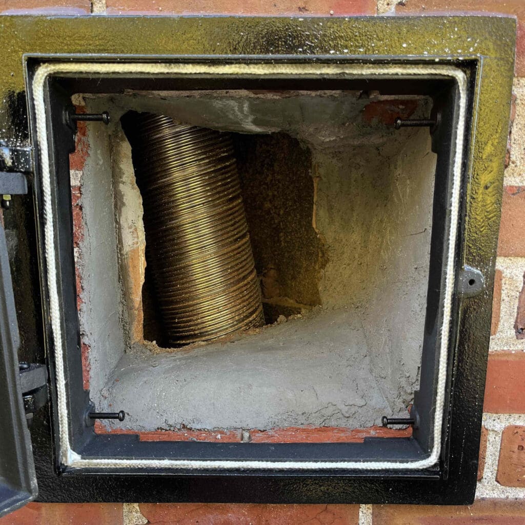 Ash Pit [Access door] - Fireplace and Chimney Professionals