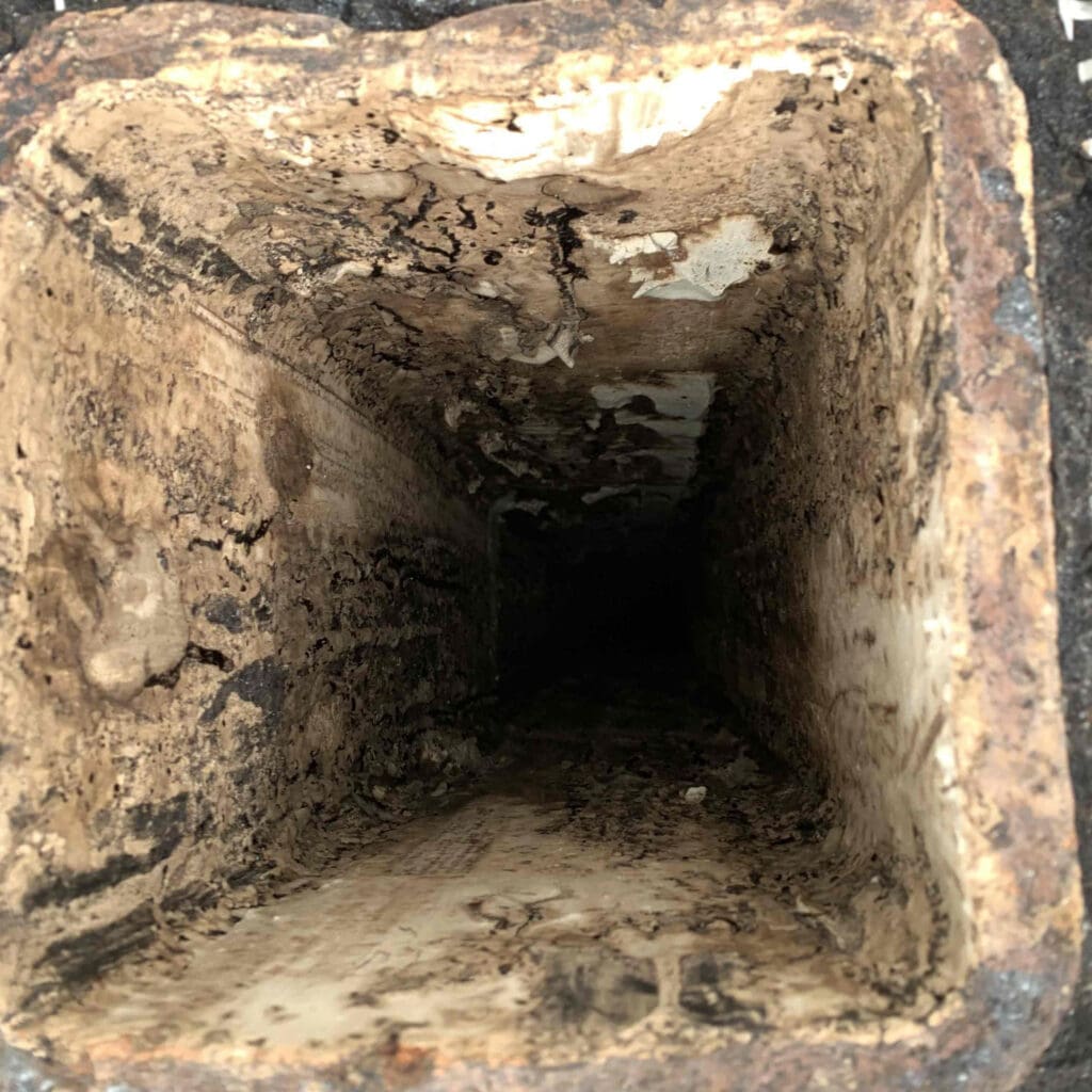 Flue Passage [Creosote Removal] - Fireplace and Chimney Professionals